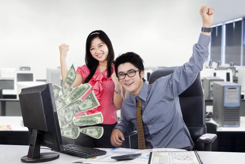 Business Team Getting Money Online in the Office Stock Photo - Image of ...