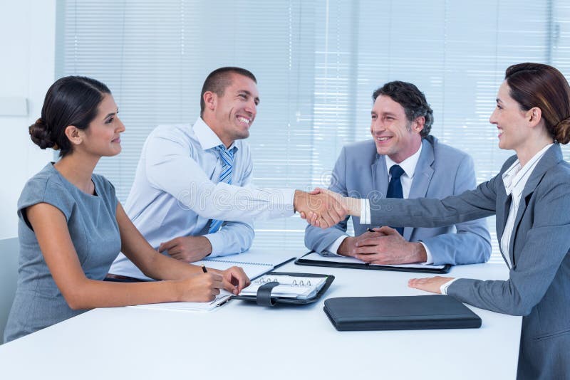 Business Team Greeting Each Other Stock Image - Image of indoors, desk ...