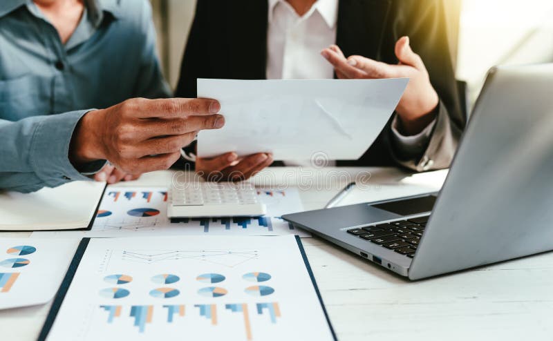 Business Team Hands Working with Document at Working with Plan on ...