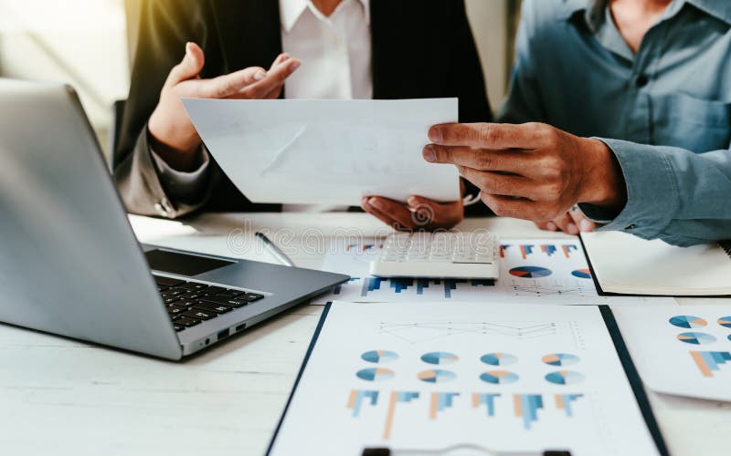 Business Team Hands Working with Document at Working with Plan on ...