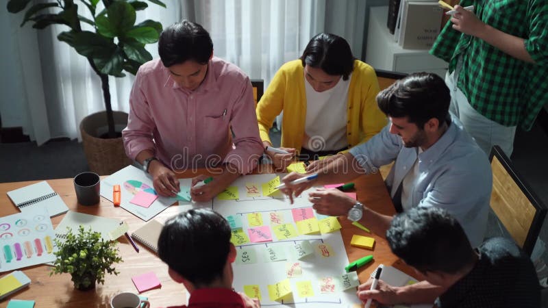 Business Team Hands Writing and Putting Sticky Note on Task Board ...