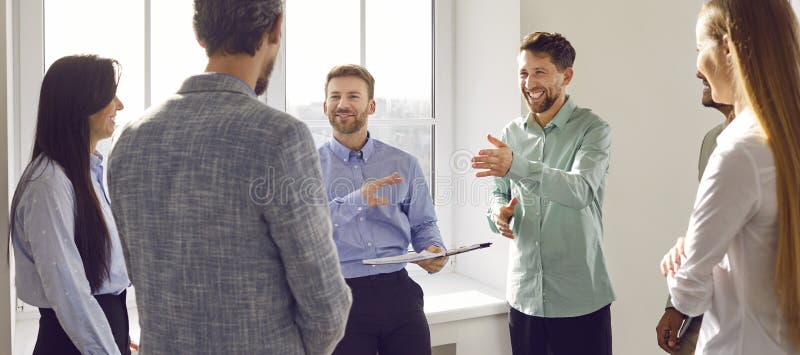 Team of Happy Business People Talking and Having Fun during a Work ...