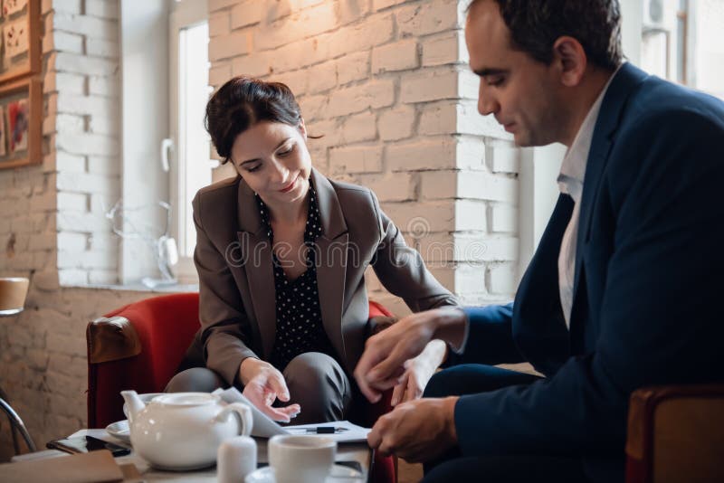 Business-team Having a Meeting at a Coffee Bar Stock Photo - Image of ...