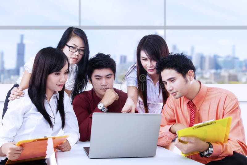 Business Team Meeting with Laptop in Office Stock Photo - Image of ...