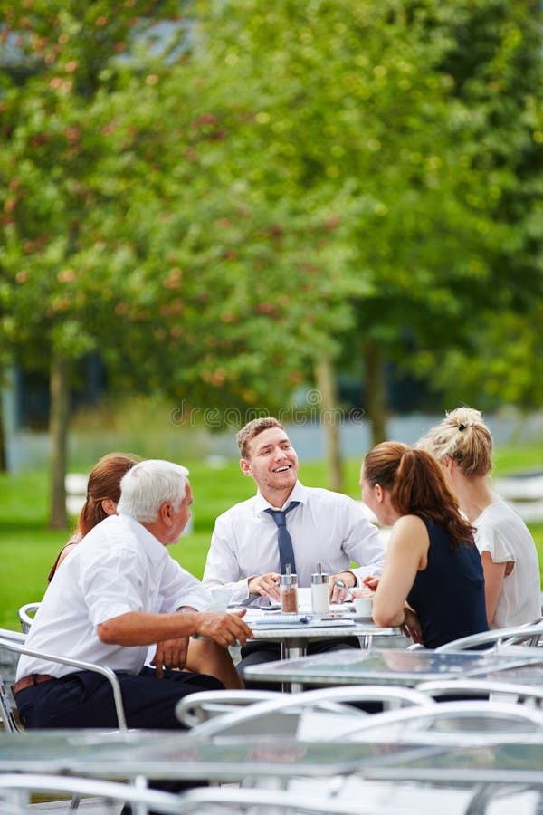 Business Team Having Meeting in Restaurant Stock Image - Image of ...