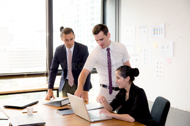 Business Team Having Using Laptop during a Meeting and Presents. Stock ...