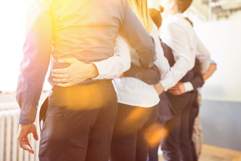 Business Team in Hug for Cooperation and Trust Stock Photo - Image of ...