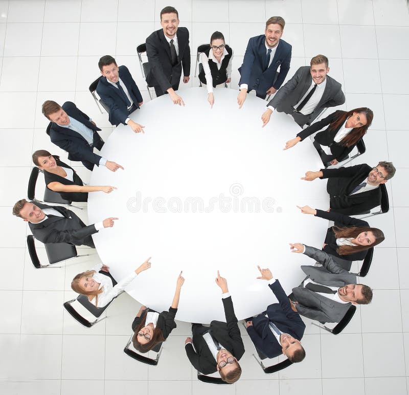 Business Team Indicates the Center of the Round Table. Stock Photo ...