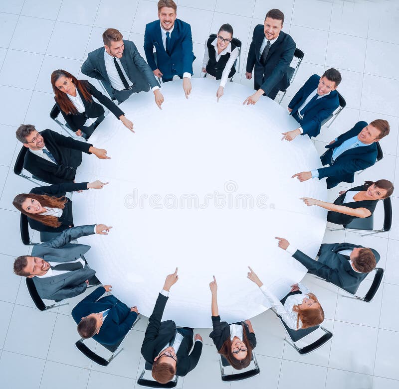 Business Team Indicates the Center of the Round Table. Stock Image ...