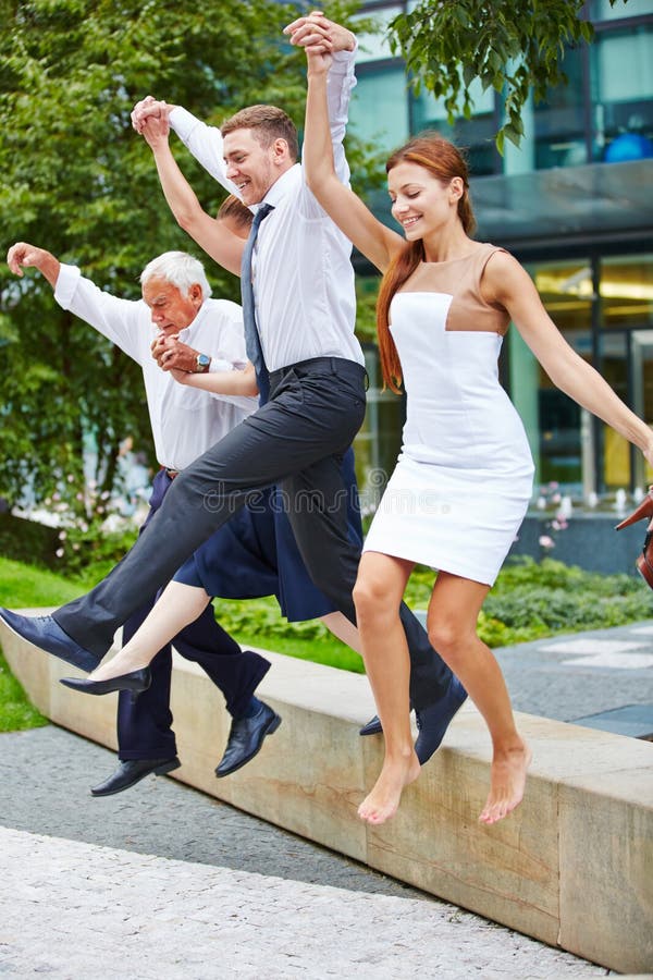 Business Team Jumping Over Obstacle Stock Image - Image of motivation ...