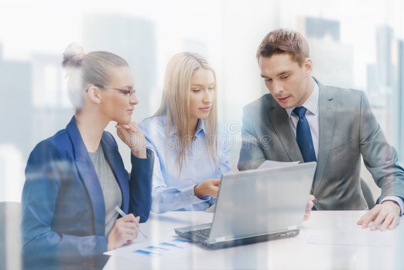 Business Team with Laptop Having Discussion Stock Photo - Image of ...