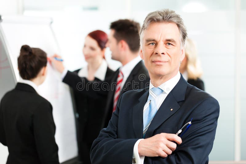 Business Team with Leader in Office Stock Image - Image of manager ...