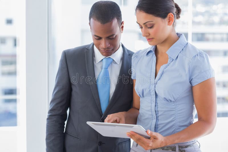 Business Team Looking at Tablet Computer Stock Image - Image of ...