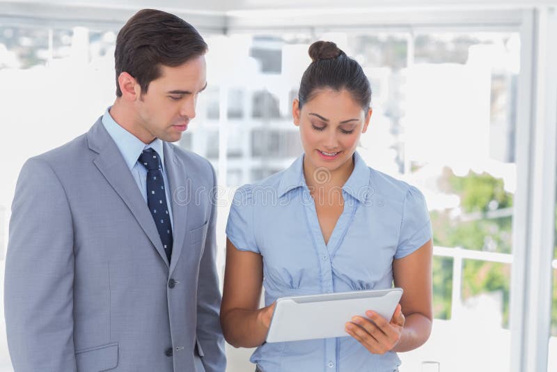 Business Team Looking at Tablet Pc Stock Photo - Image of smiling ...