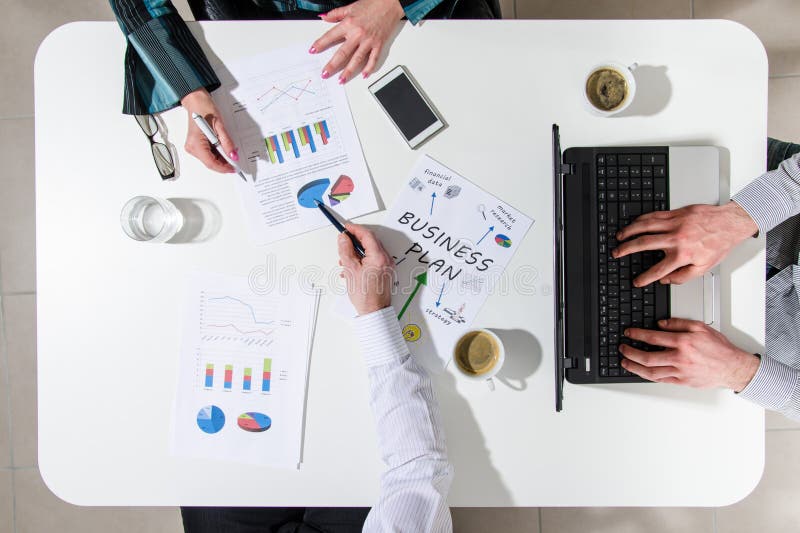 Business Team at a Meeting Talking about Business Plan Stock Photo ...