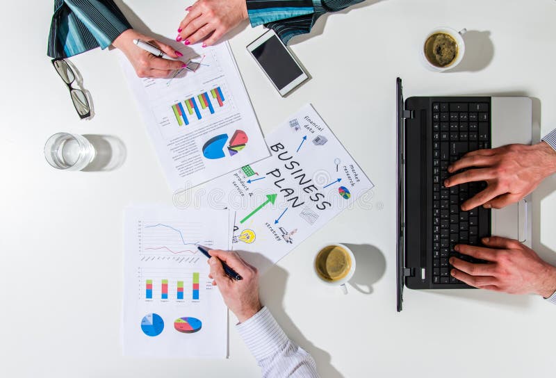 Business Team at a Meeting Talking about Business Plan Stock Photo ...