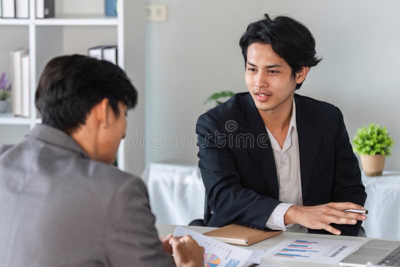 Business Team Meeting To Exchange Ideas and Collaborate on Work ...