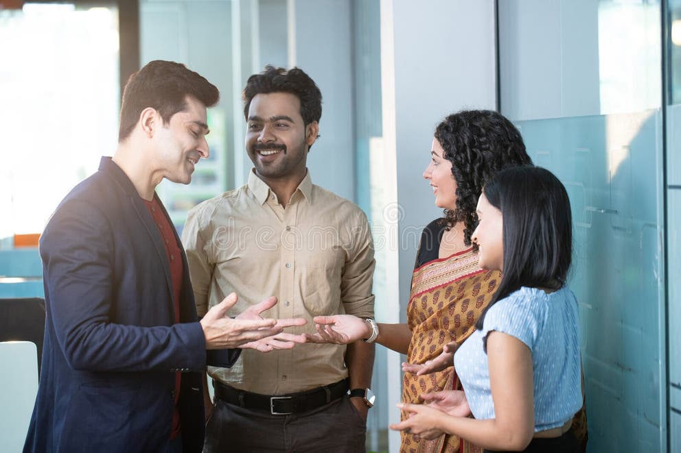 Business Team Members Discussing Work at Office Stock Photo - Image of ...