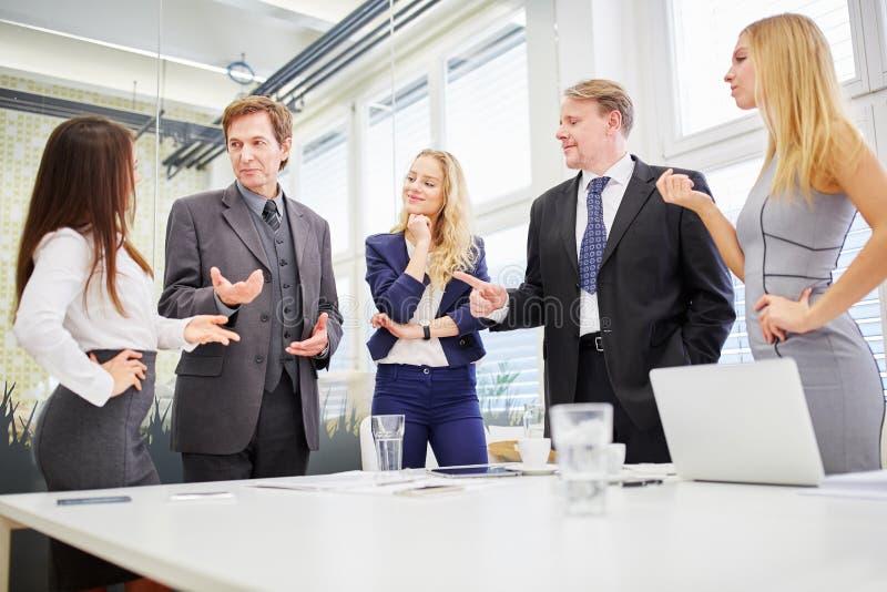 Business team negotiating stock image. Image of profession - 76577071