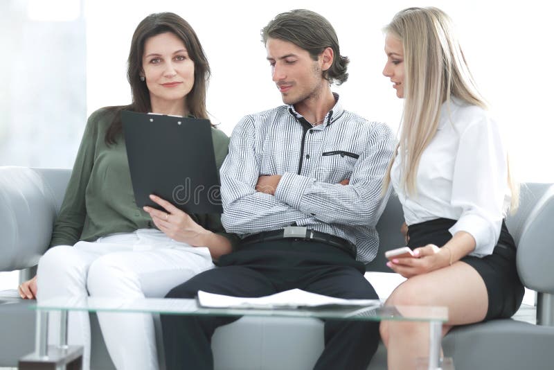 Business Team Reading Work Documents. Office Life Stock Image - Image ...