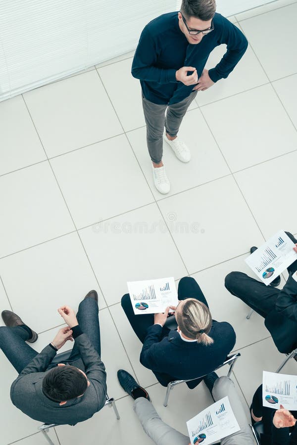 Business Team Reporting Results at a Working Meeting. Stock Image ...