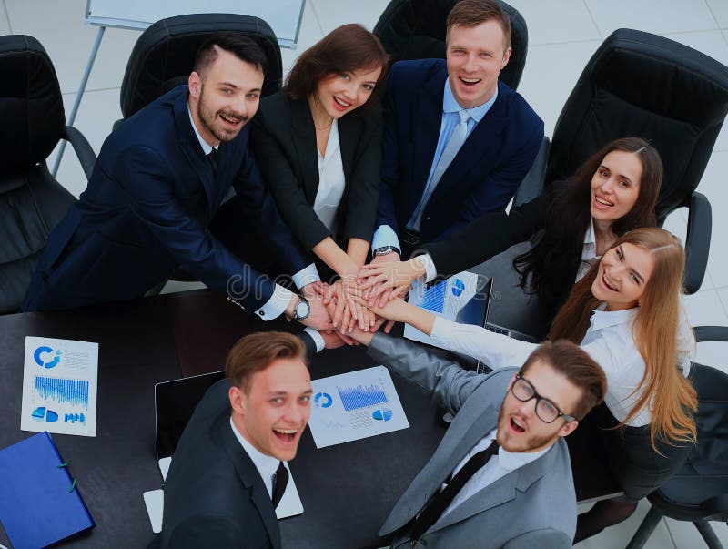 Business Team Showing Unity with Their Hands Together. Stock Photo ...