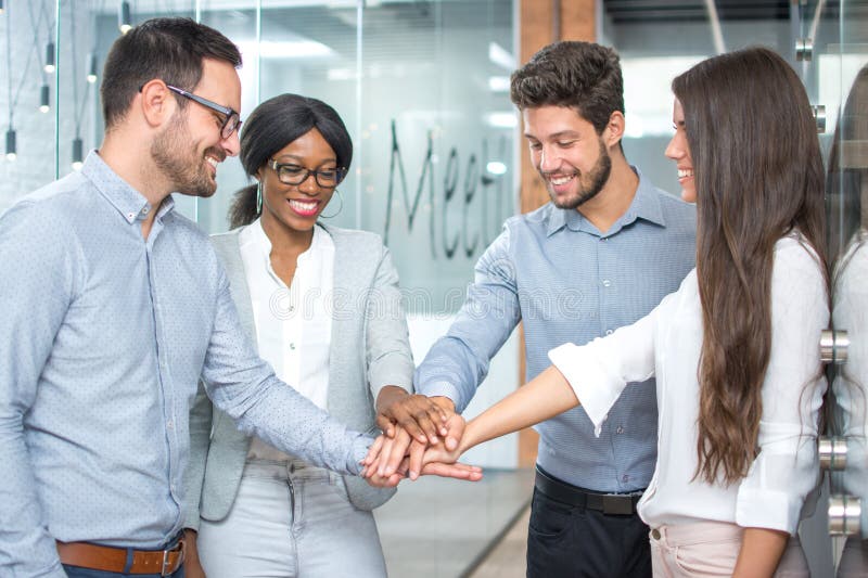 Business Team Showing Unity with Their Hands Together. Stock Photo ...