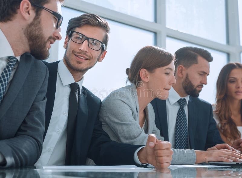 Business Team Sitting at the Office Desk in the Office Stock Photo ...