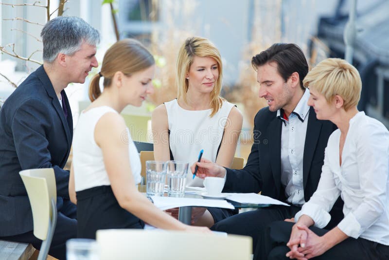 Business Team is Sitting Outside in the Meeting Stock Image - Image of ...