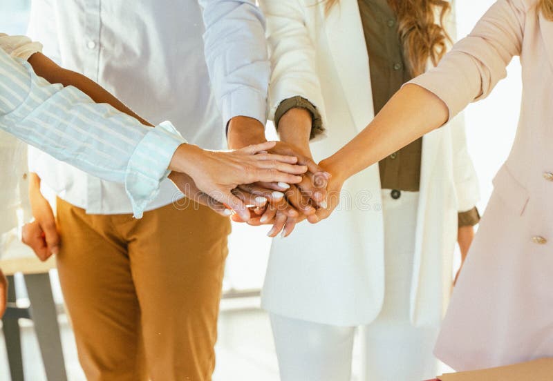 Business Team Stacking Their Hands Showing Unity and Support Stock ...