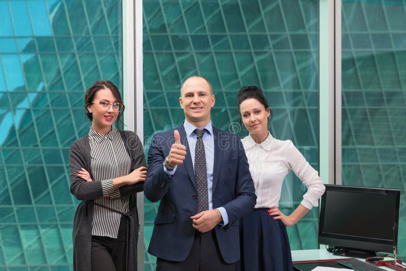 Business Team Standing in Office . Stock Image - Image of professional ...