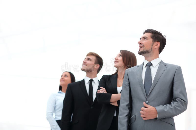 Business Team Standing One Behind the Other and Looking Forward Stock ...