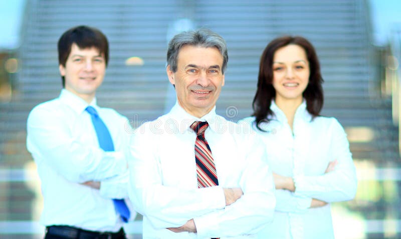 Business Team Smiling Standing Upright Their Hands Their Hips Stock ...