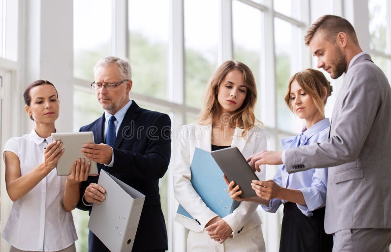 Business Team with Tablet Pc and Folders at Office Stock Image - Image ...