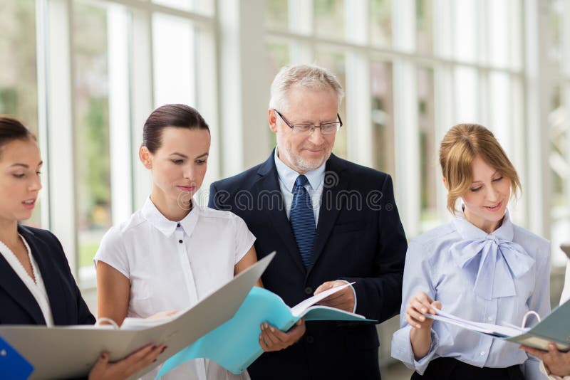 Business Team with Tablet Pc and Folders at Office Stock Photo - Image ...