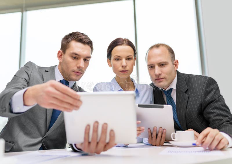 Business Team with Tablet Pc Having Discussion Stock Photo - Image of ...