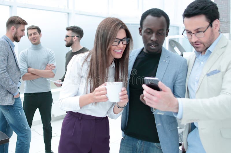 Business Team Talking while Standing in a Modern Office Stock Photo ...