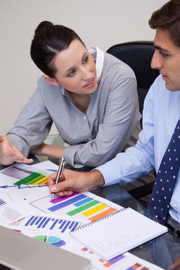 Business Team Talking about Statistics Stock Photo - Image of graph ...
