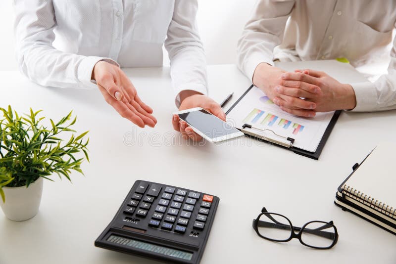 Business Team Two Colleagues Discussing New Plan Financial Graph Data ...