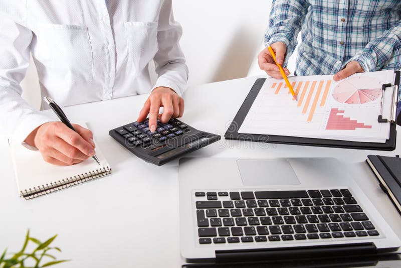 Business Team Two Colleagues Discussing New Plan Financial Graph Data ...