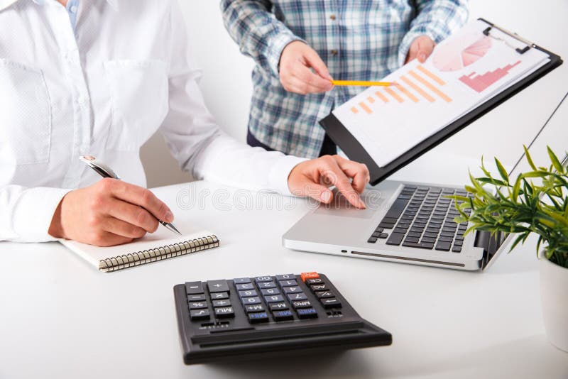 Business Team Two Colleagues Discussing New Plan Financial Graph Data ...