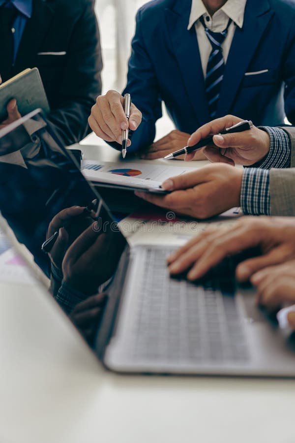 Business Team Two Managers Work on Accounting Documents and the Team ...