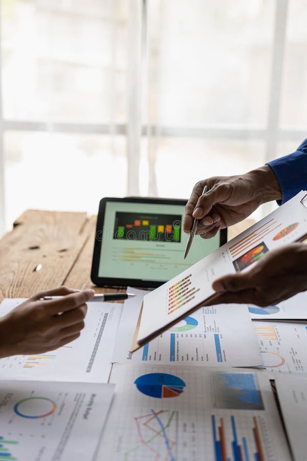 Business Team Two Managers Work on Accounting Documents and the Team ...