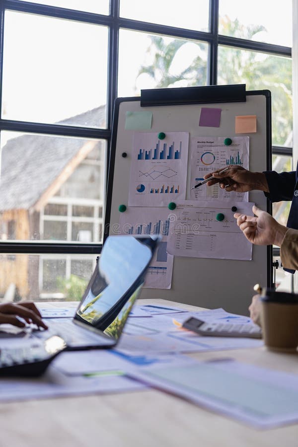 Business Team Two Managers Work on Accounting Documents and the Team ...