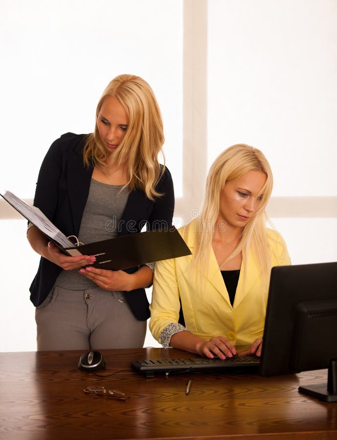 Business Team Two Women Work Office Checking Database Stock Photos ...