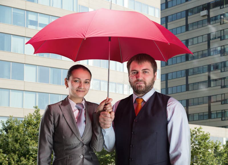 Business Team Under Umbrella Stock Image - Image of downtown, friendly ...