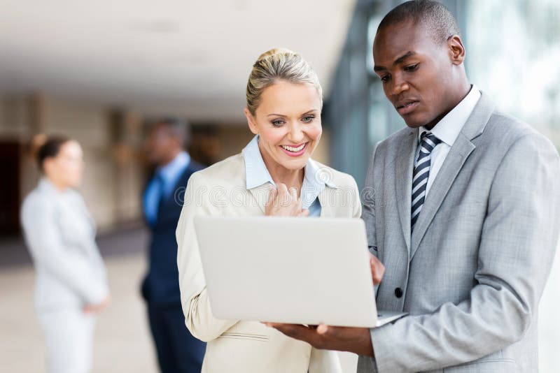 Business team using laptop stock image. Image of colleagues - 67643519