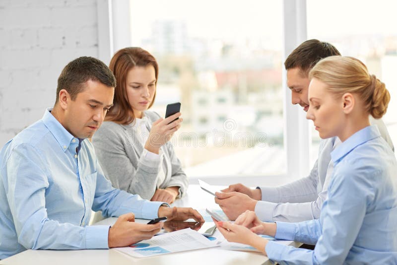 Business Team Using Smartphones at Office Stock Image - Image of office ...
