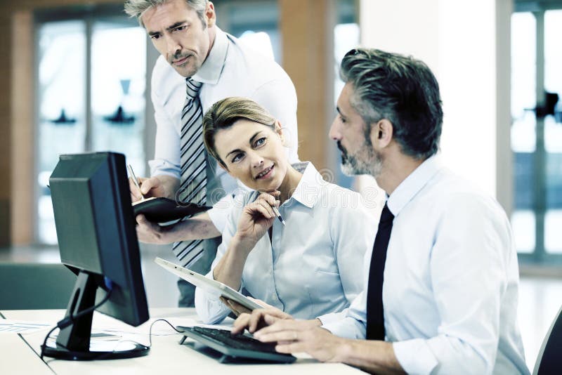 Business Team at Work on Desktop Computer Stock Photo - Image of ...