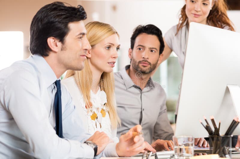 Business Team Working on Computer Stock Photo - Image of teamwork ...